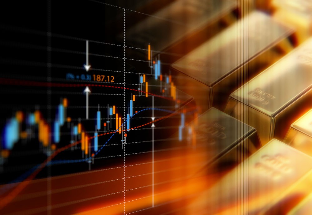 Ouro cai mais de 2% e encosta em menor nível do mês com dólar forte